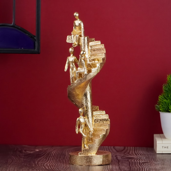 Gold Figures on Spiral Staircase Sculpture – The Golden Theory